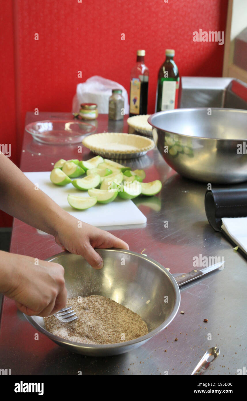 A person mixing ingredients for a pie Stock Photo - Alamy
