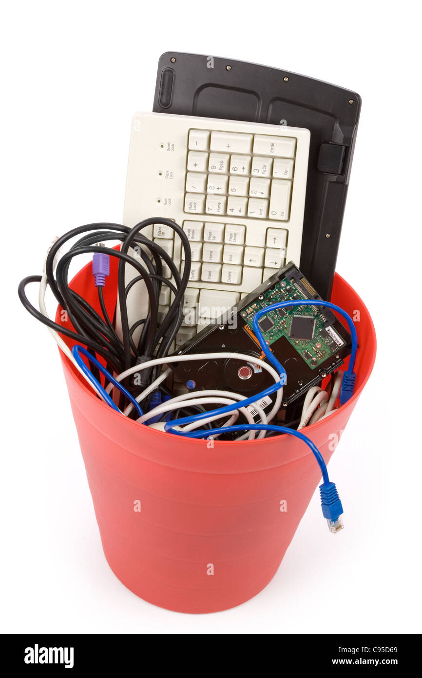 Red Garbage Can and Discarded Computer Hardware Stock Photo - Alamy