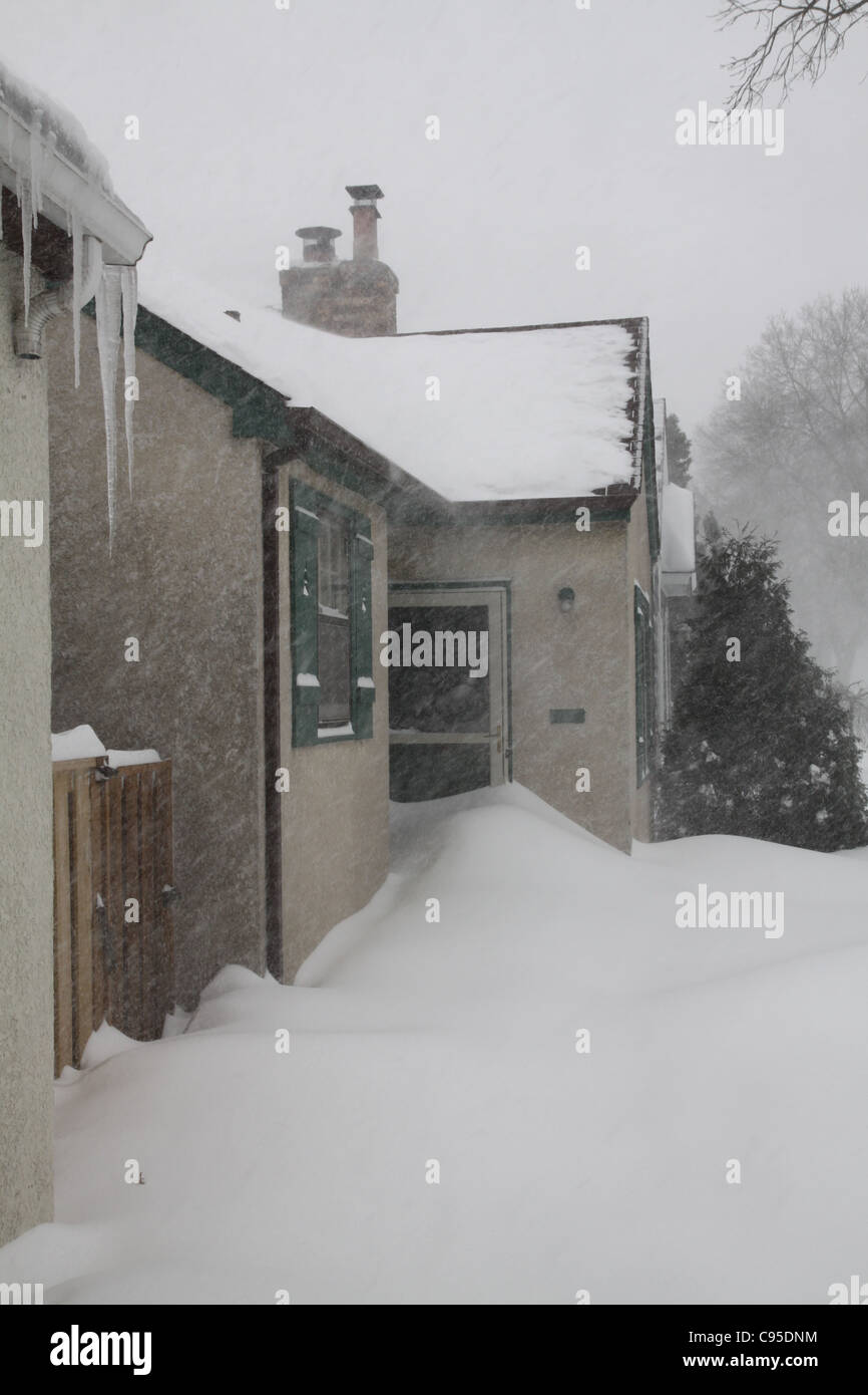 A house in a snowstorm Stock Photo - Alamy