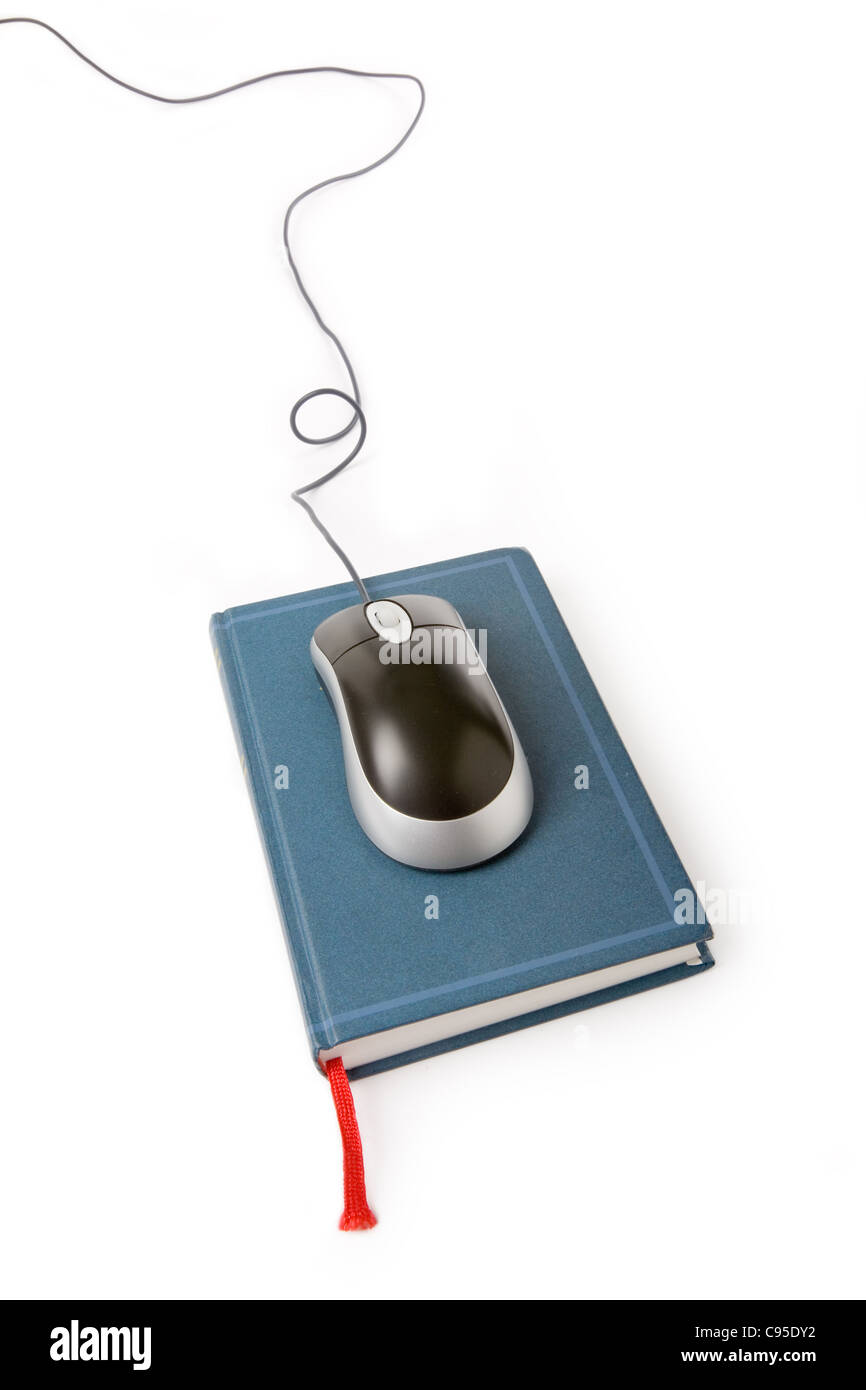 computer mouse and book, concept of online education Stock Photo - Alamy