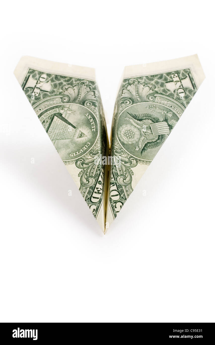 dollar paper airplane, business concept Stock Photo - Alamy