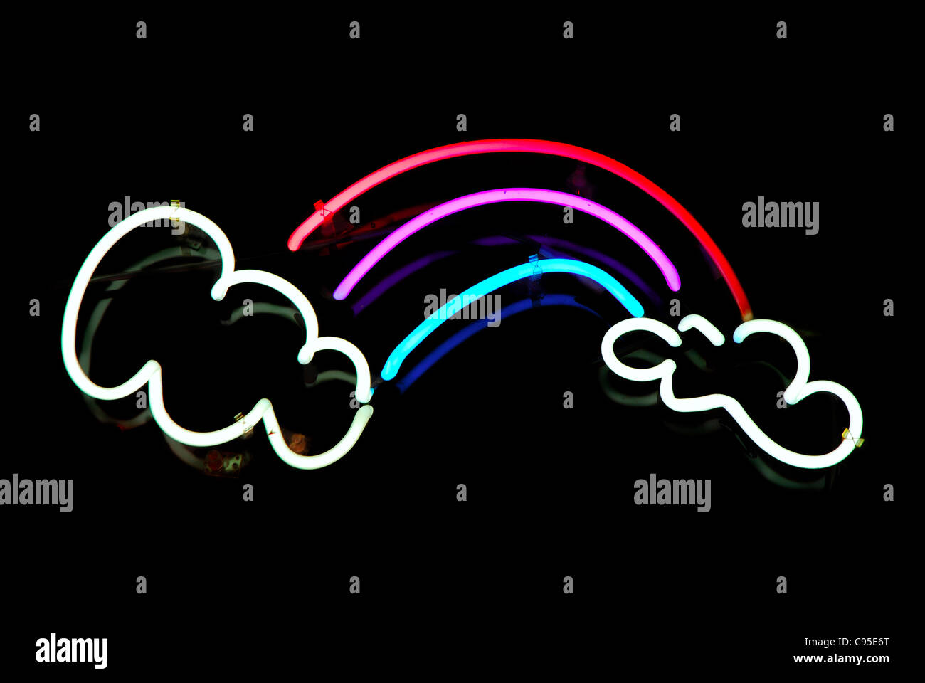 Rainbow with clouds neon sign isolated on black background Stock Photo ...