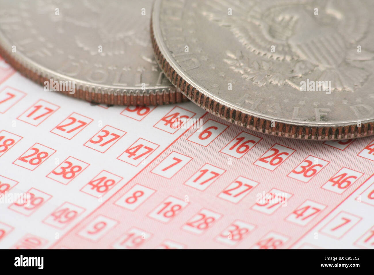 Lottery Ticket and coins close up shot Stock Photo - Alamy