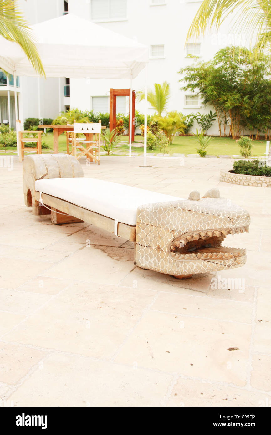 Home exterior patio with handcraft wooden sofa with an aligator ...