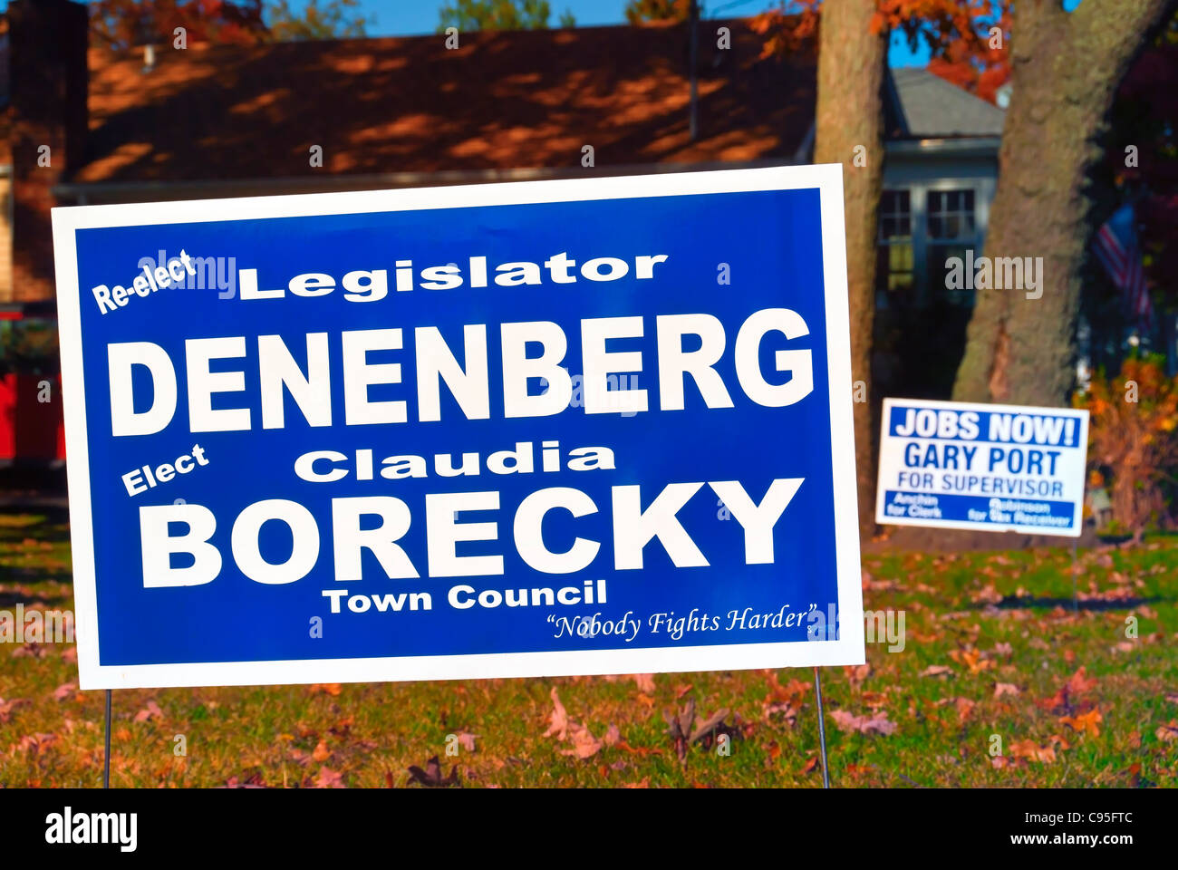 Two political lawn signs in front yard of home in autumn, Election Day ...