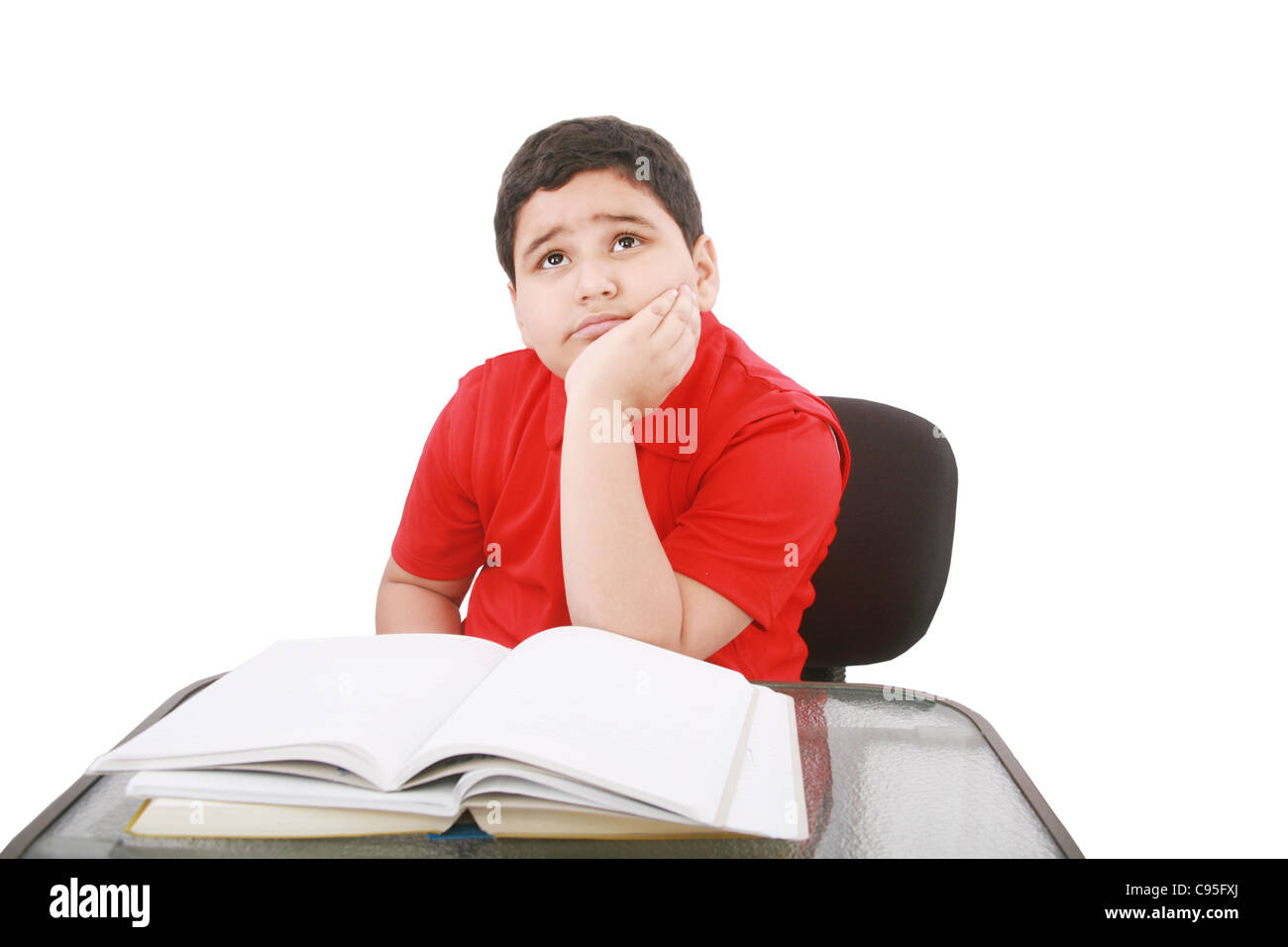 Portrait of a stressed young student with a of books to read Stock ...