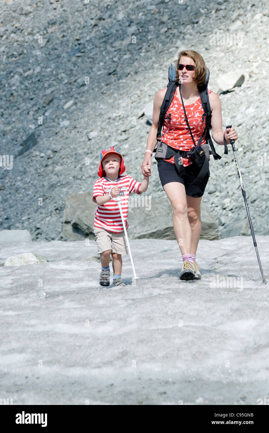 People walking to the Dix hut Switzerland Stock Photo - Alamy