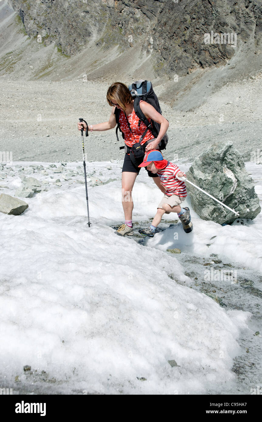 People walking to the Dix hut Switzerland Stock Photo - Alamy