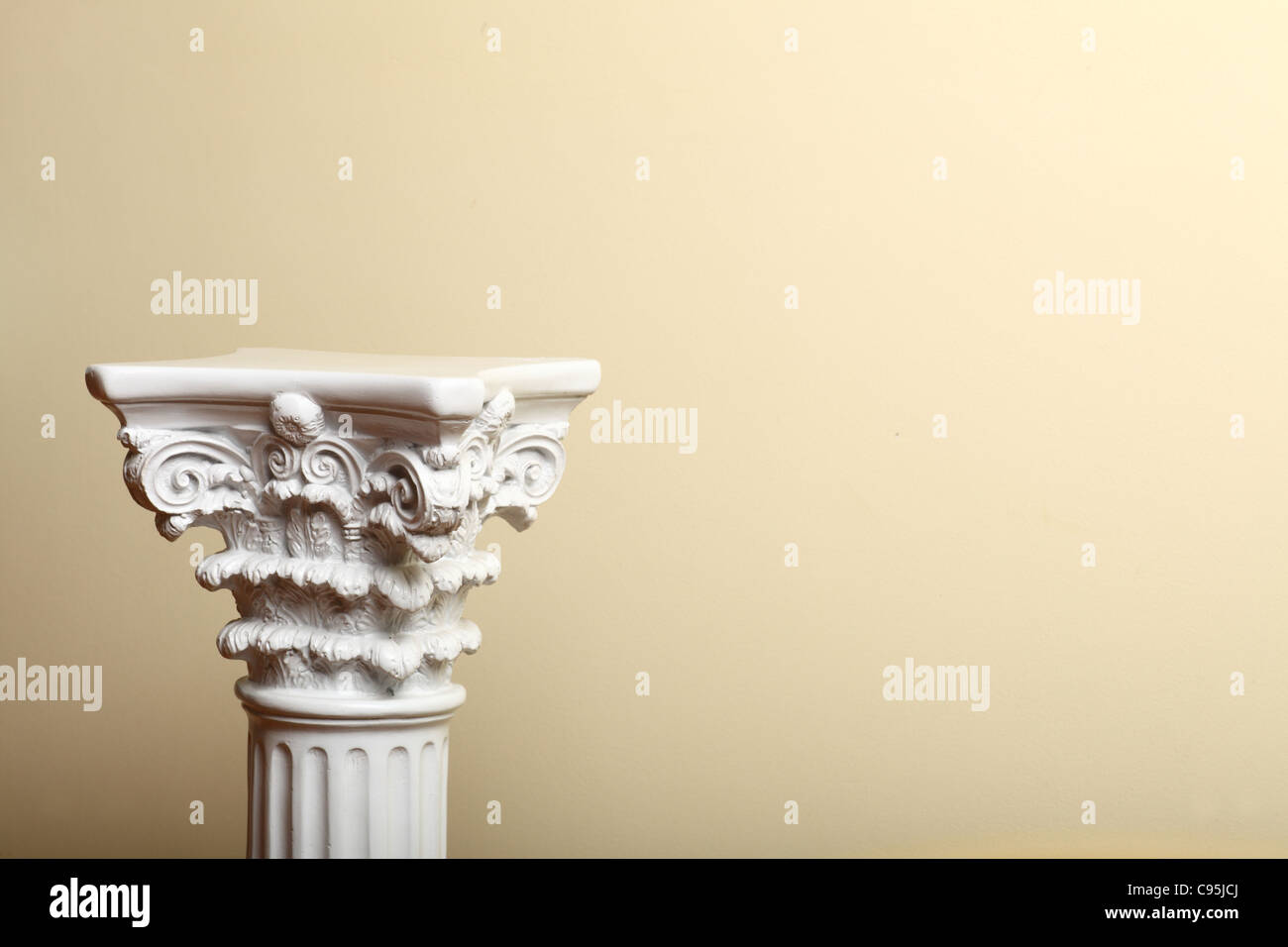 white column indoor on yellow background Stock Photo - Alamy
