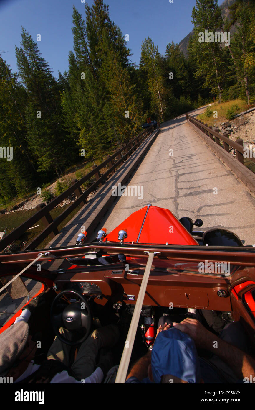 Red bus of glacier national park Stock Photo - Alamy
