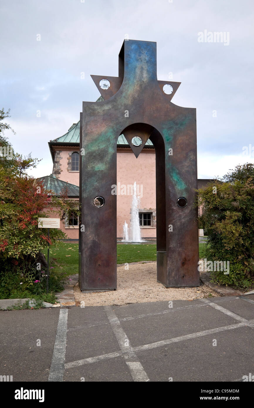 A pathway going through a metal archway Stock Photo - Alamy