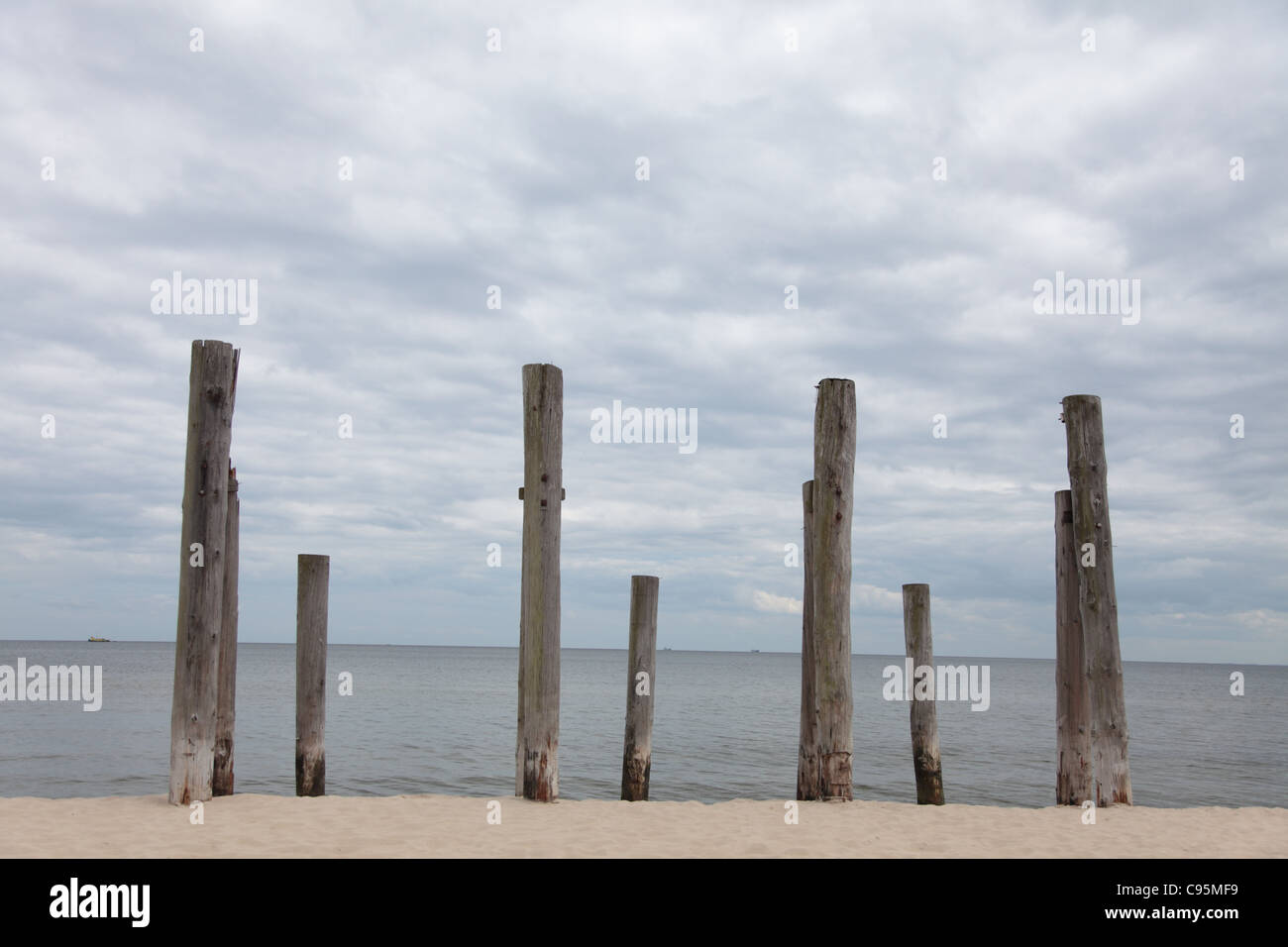 rows of piles on the sea beach - outdoor Stock Photo - Alamy
