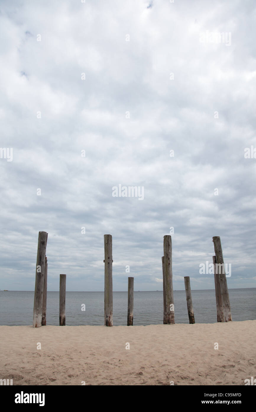 rows of piles on the sea beach - outdoor Stock Photo - Alamy