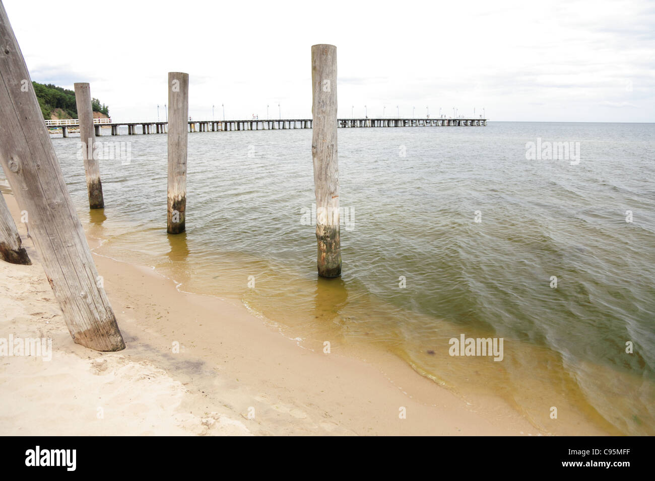 rows of piles on the sea beach - outdoor Stock Photo - Alamy