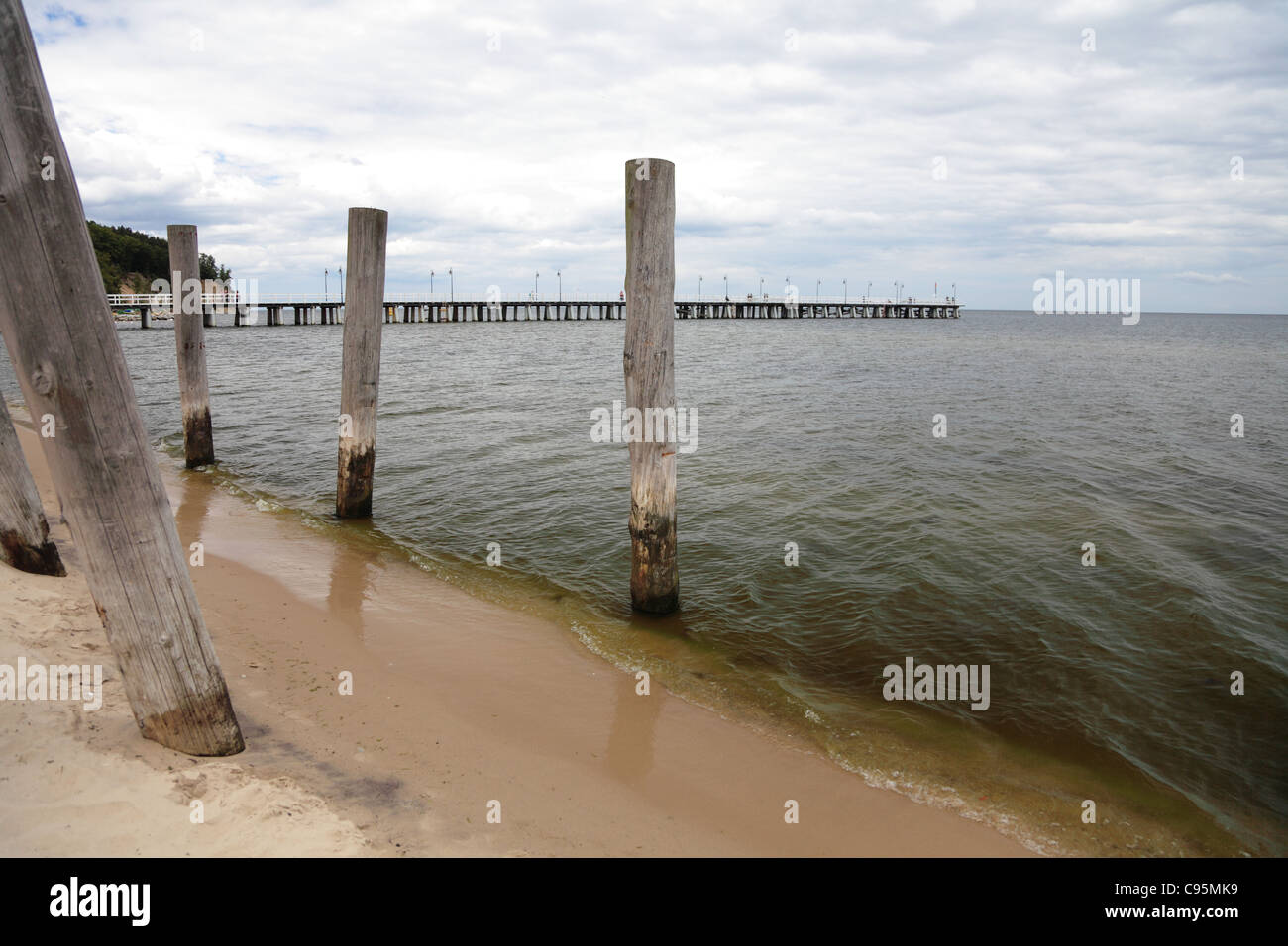 rows of piles on the sea beach - outdoor Stock Photo - Alamy