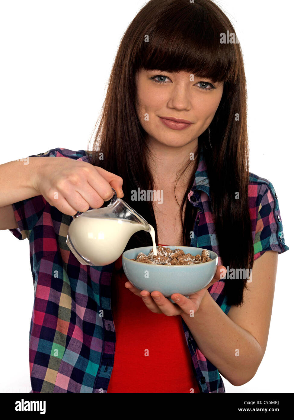 Young Woman Eating Breakfast Cereal. Model Released Stock Photo - Alamy