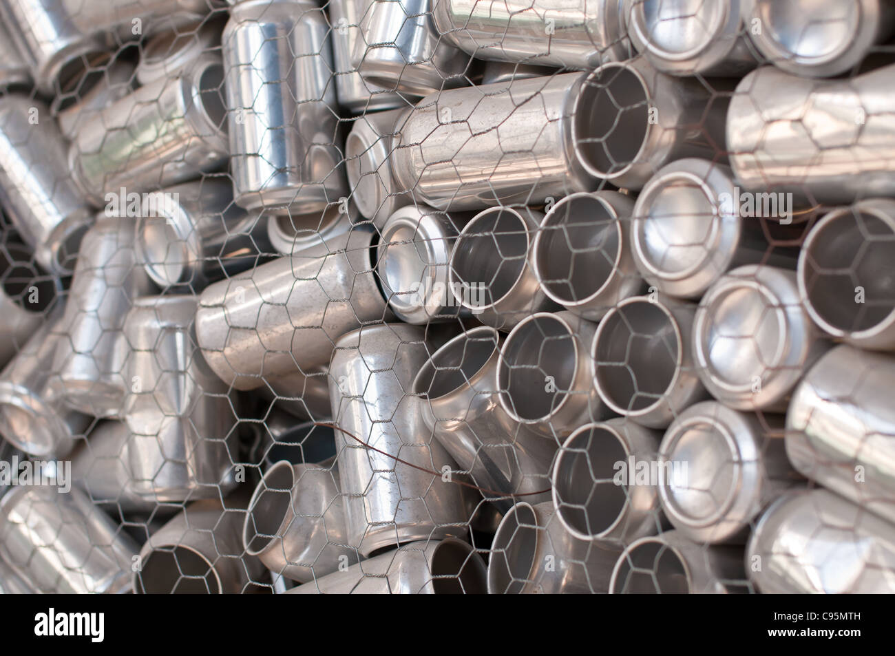 A container of aluminum drink cans collected for recycling Stock Photo ...