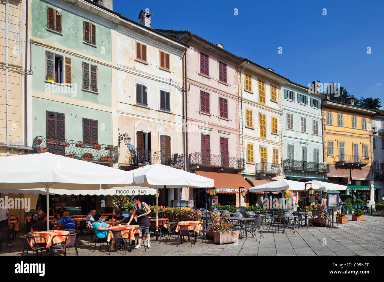 Italy, Piedmont, Lake Orta, Orta Town, Cafes in the Piazza Mario Motta ...