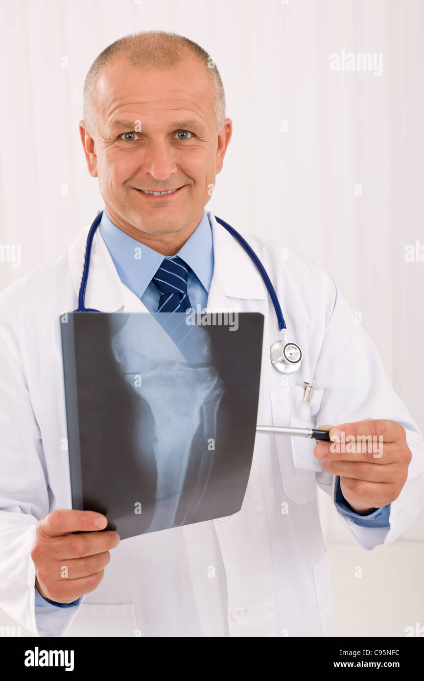 Portrait of professional male doctor hold and point x-ray Stock Photo ...