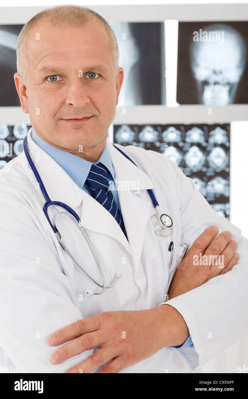 Portrait of male doctor standing at front of set x-ray Stock Photo - Alamy
