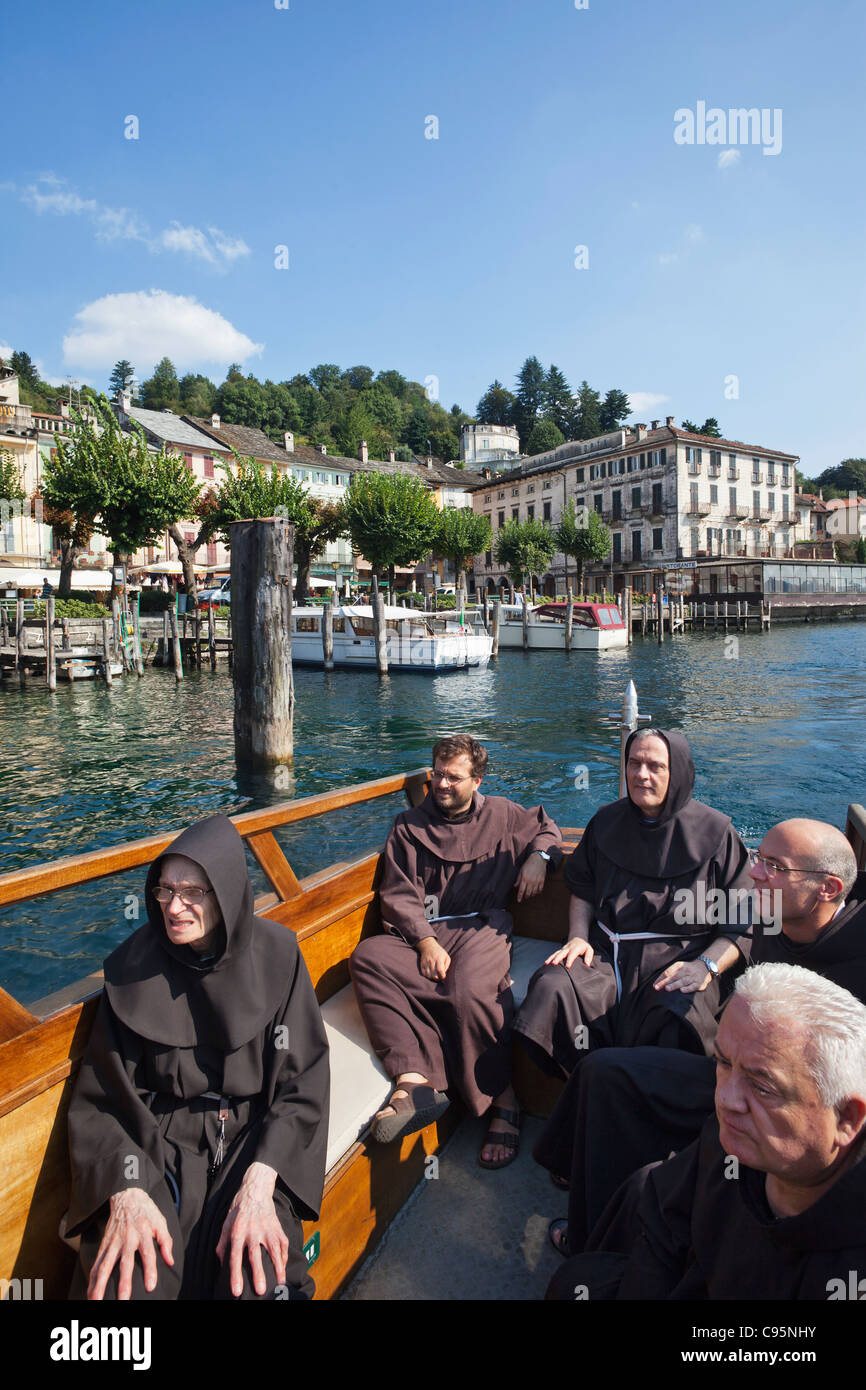 Italy, Piedmont, Lake Orta, Franciscan Monks on Boat to San Giulio ...