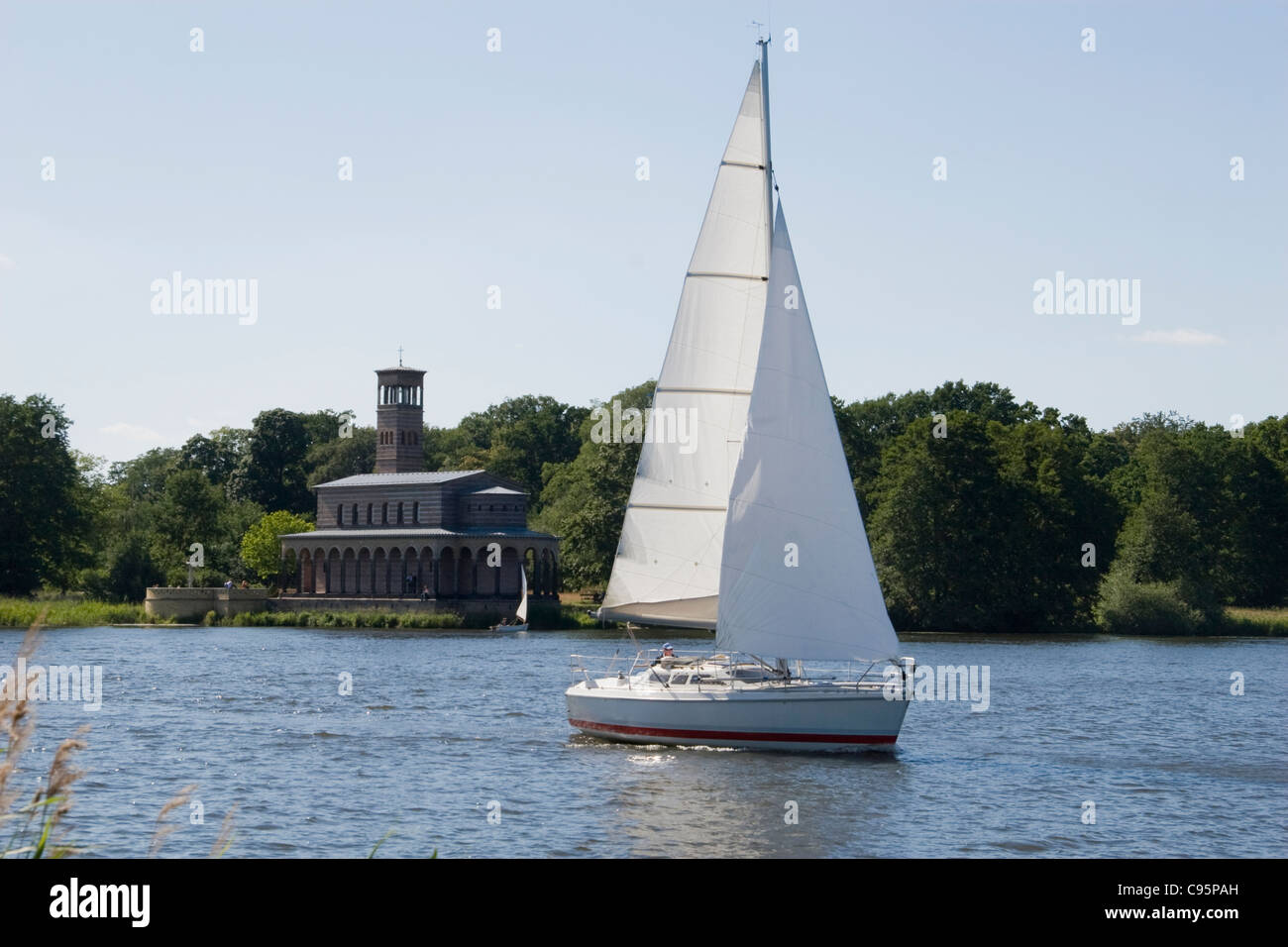 Sacrower church with sailboat Stock Photo - Alamy