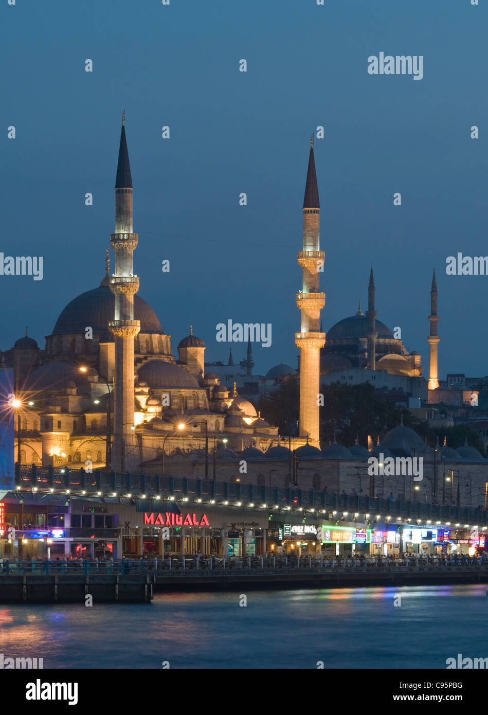 The Galata Bridge and The New Mosque at night,istanbul,turkey Stock ...