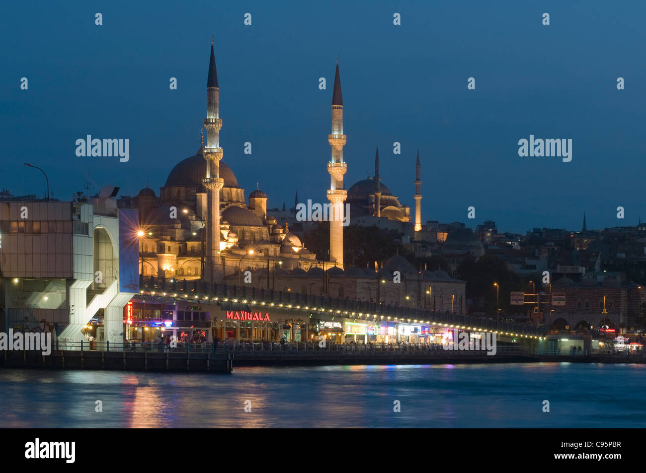 The Galata Bridge and The New Mosque at night,istanbul,turkey Stock ...