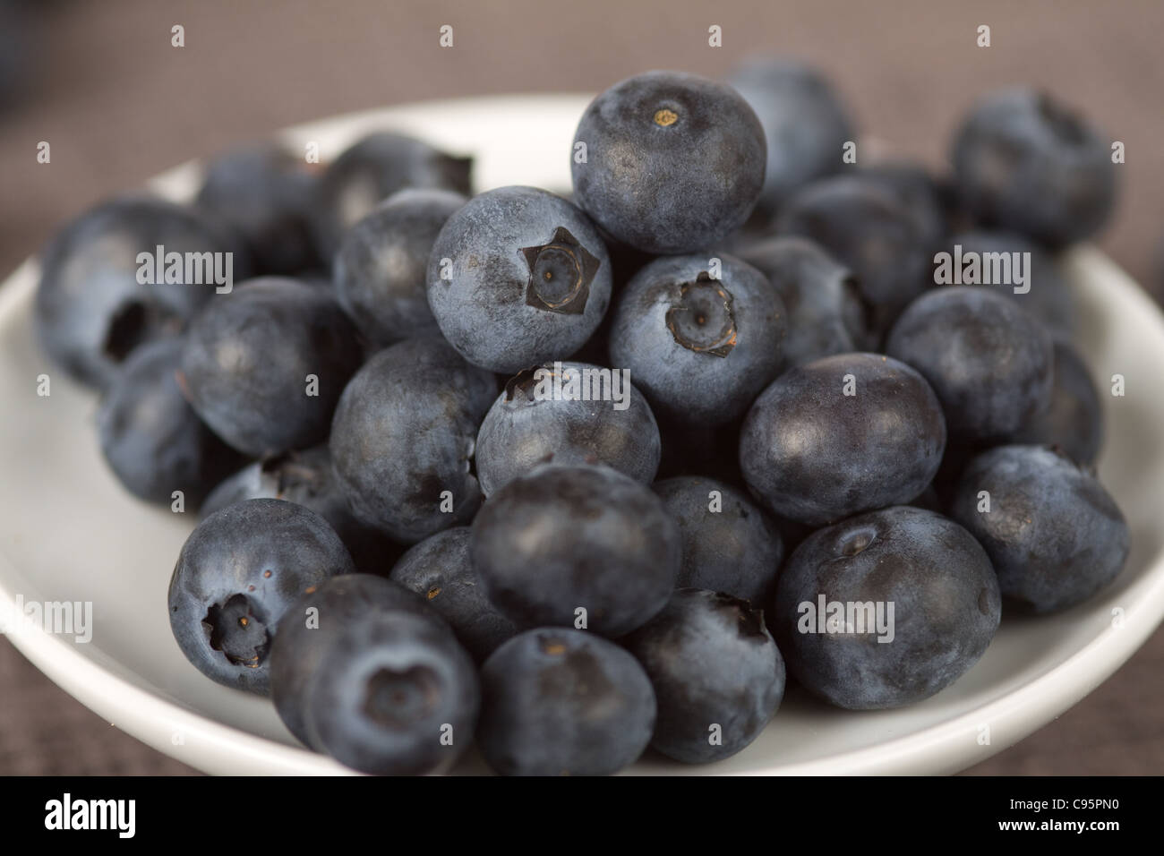 Blueberries on a plate Stock Photo - Alamy