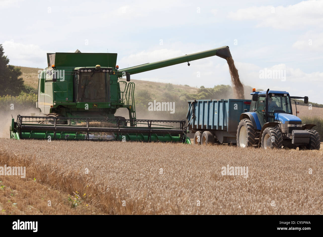 Combine harvester collecting wheat hi-res stock photography and images ...