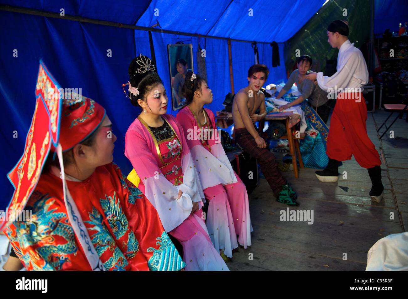 Chinese Huangmei opera artists from Anhei province rest backstage ...