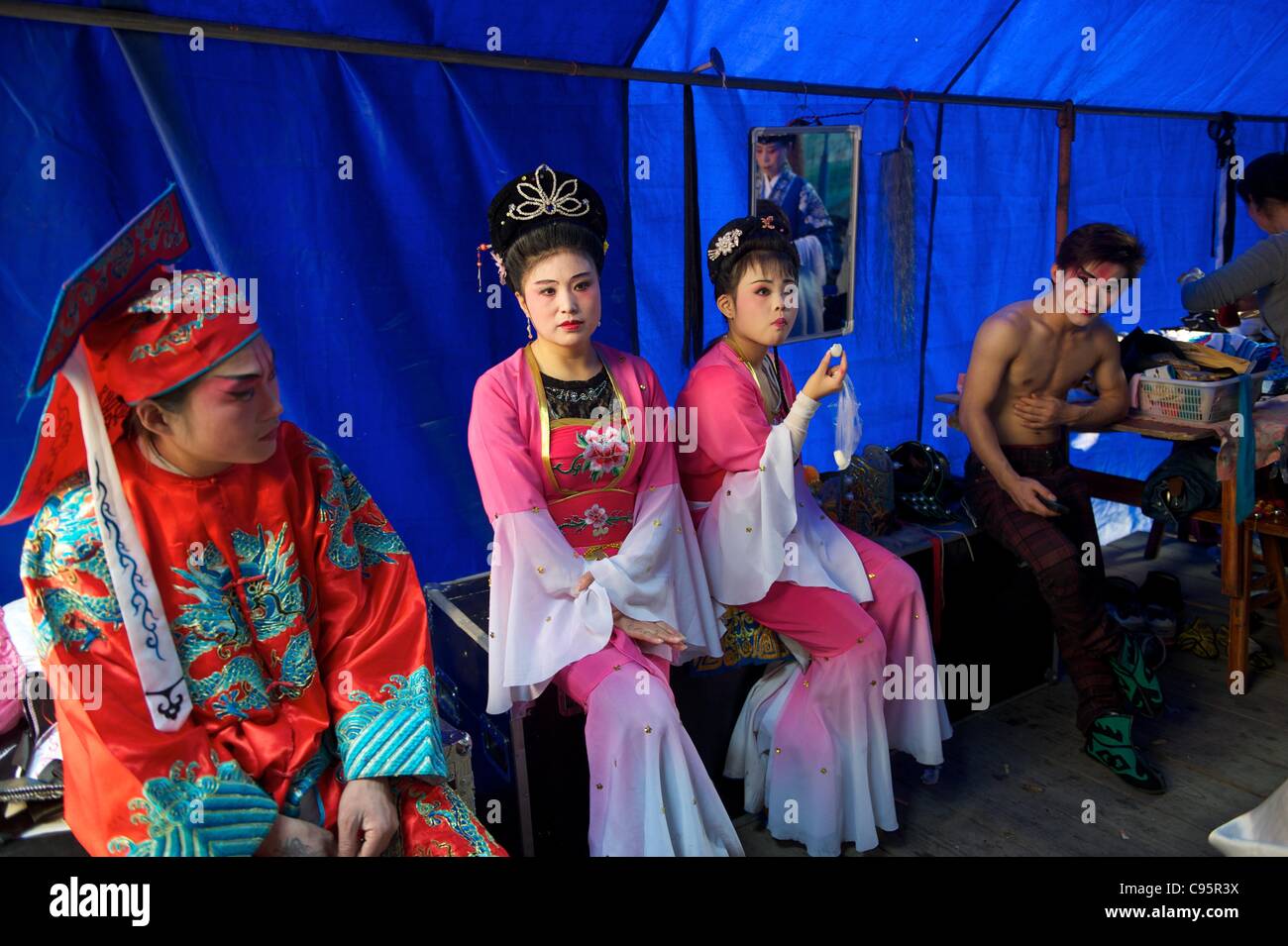 Chinese Huangmei opera artists from Anhei province rest backstage ...