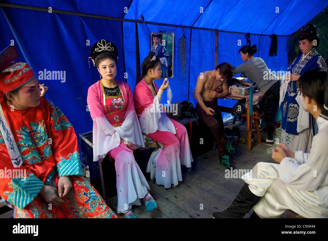 Chinese Huangmei opera artists from Anhei province rest backstage ...