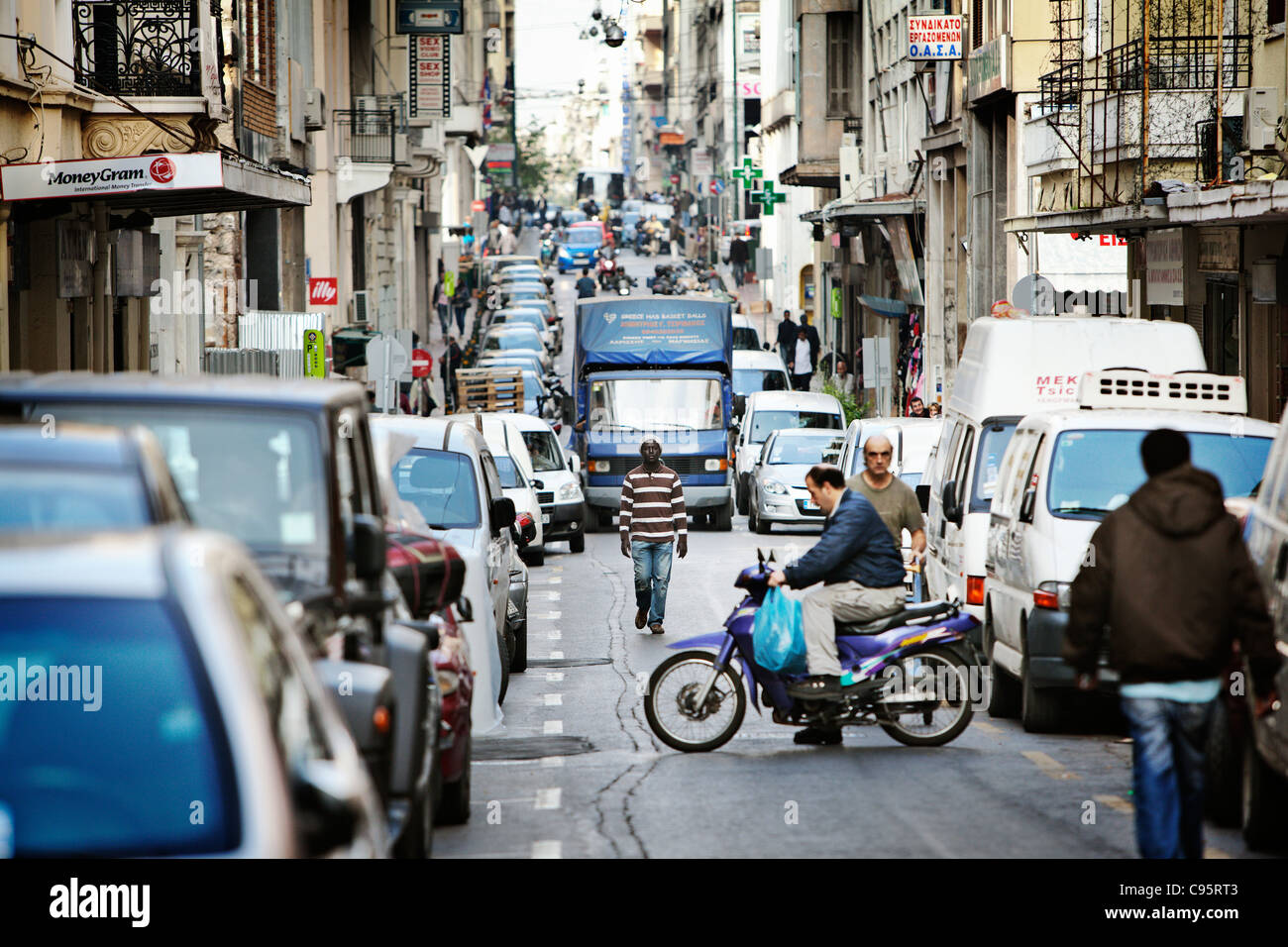 African immigrant in Omonoia (Omonoias) district in the centre of Athens, Greece Stock Photo - Alamy