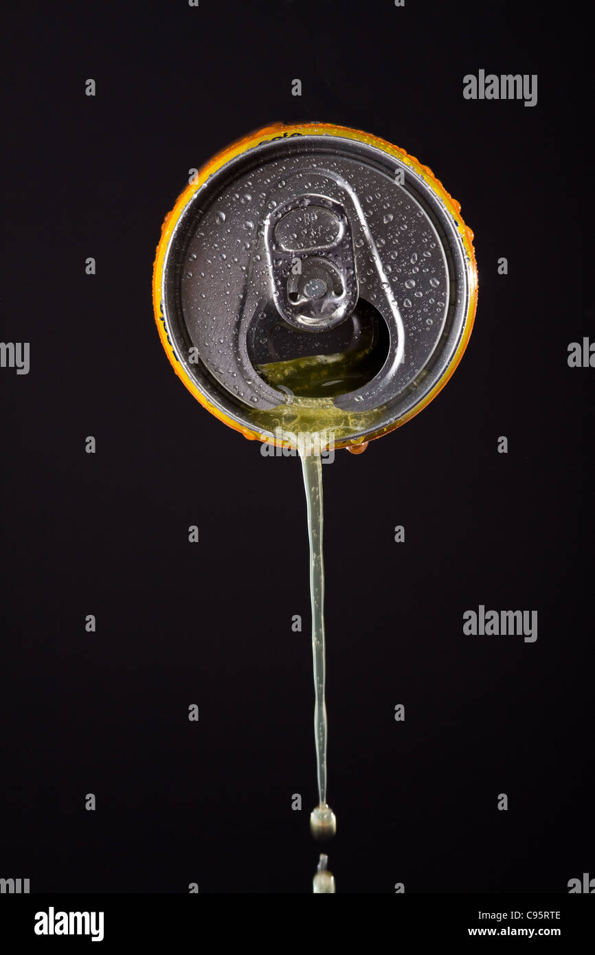 Beverage can is poured Stock Photo - Alamy