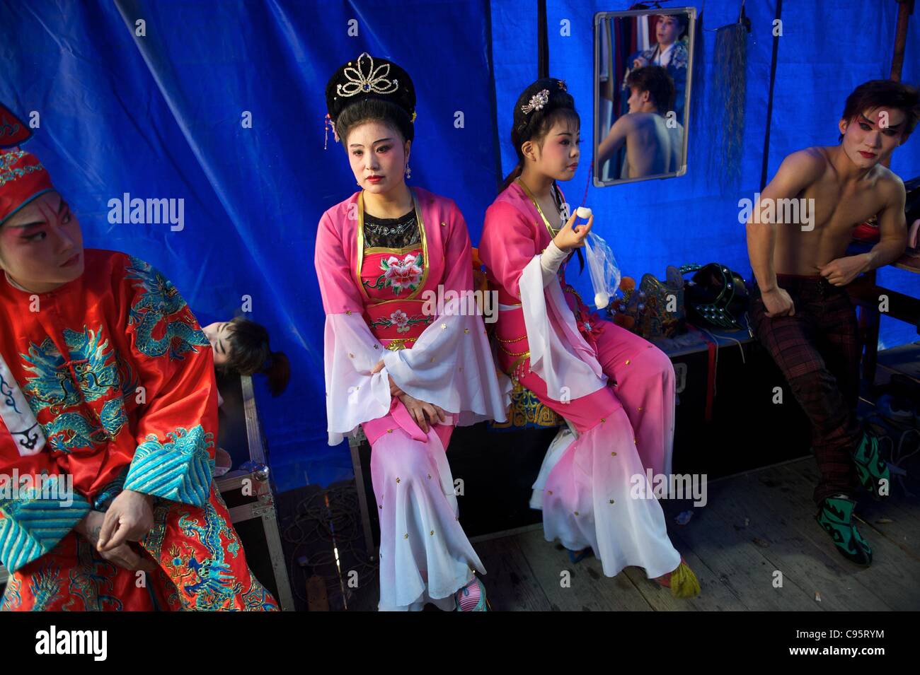 Chinese Huangmei opera artists from Anhei province rest backstage ...