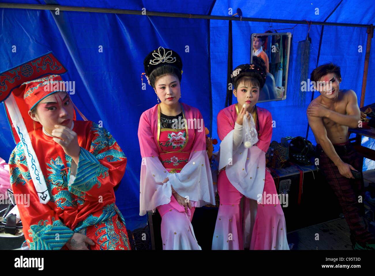 Chinese Huangmei opera artists from Anhei province rest backstage ...