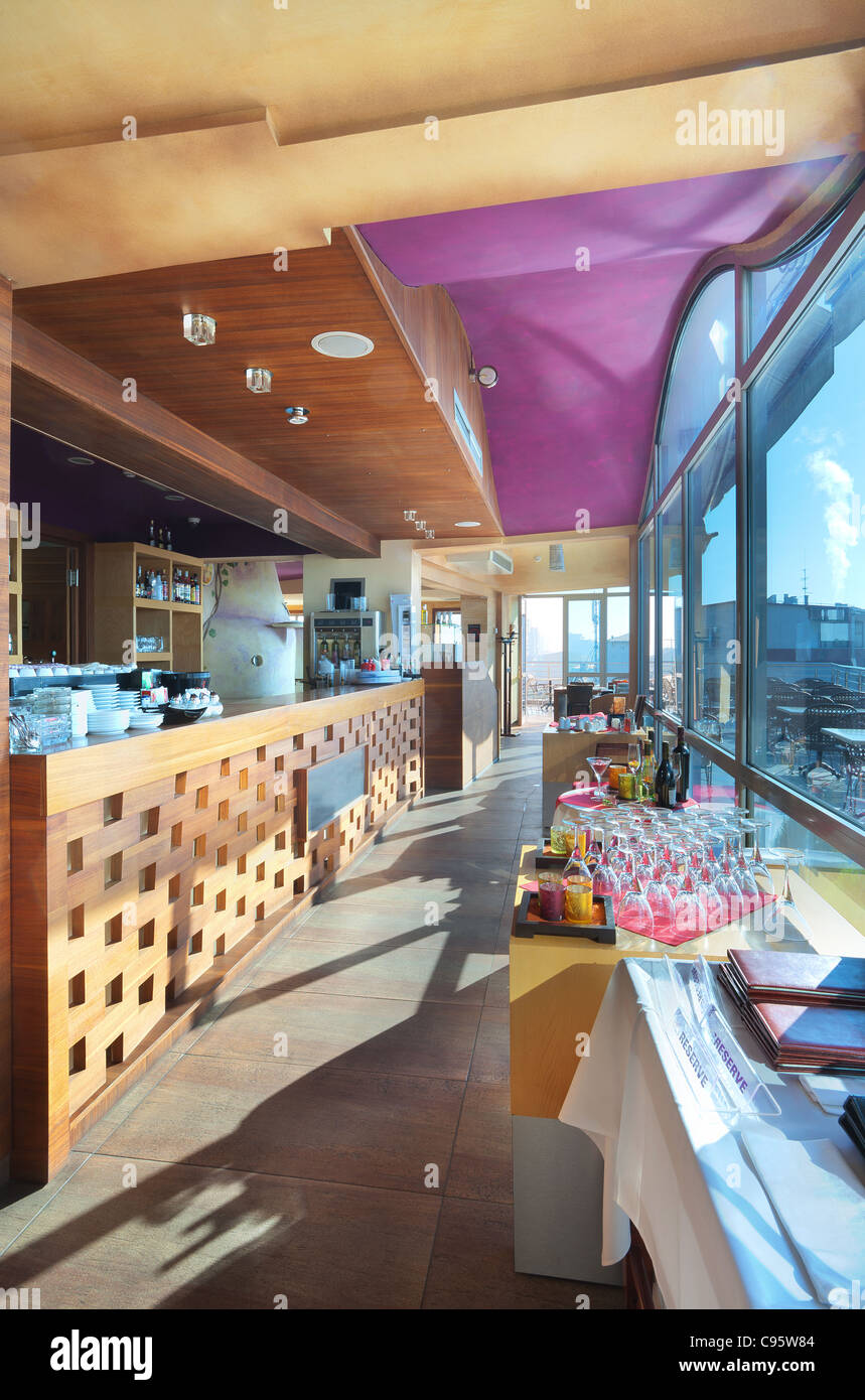 Part of a cafe interior, view on bar and terrace Stock Photo - Alamy