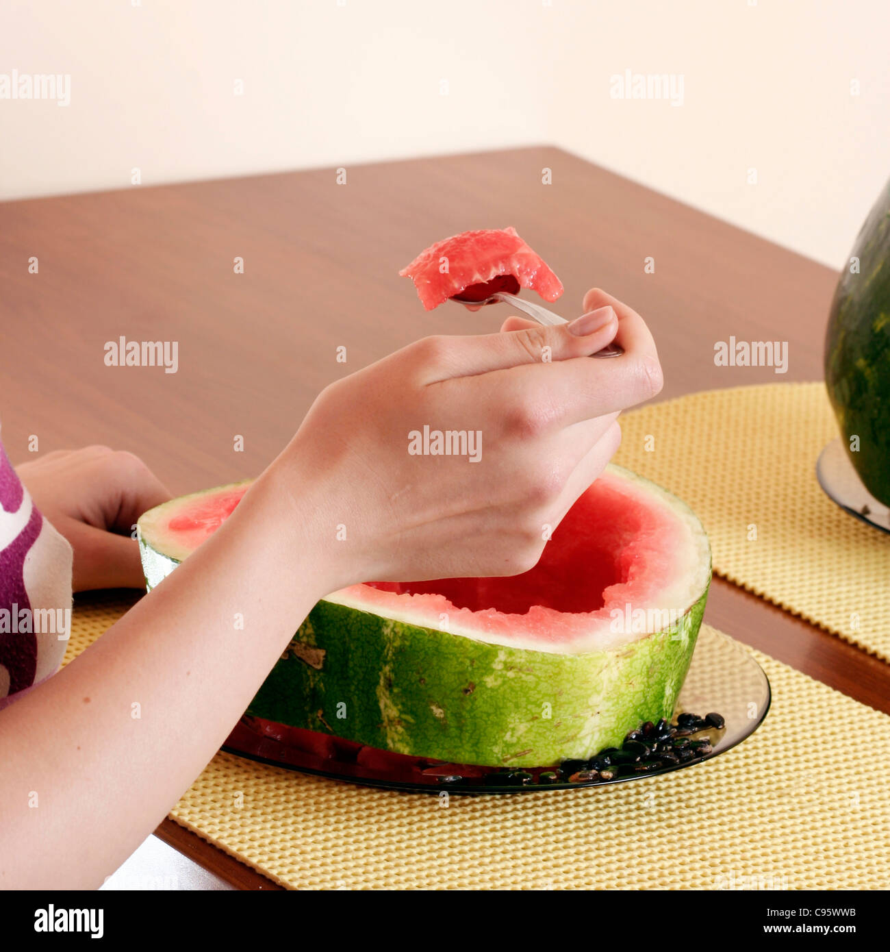 Woman slice juicy watermelon hi-res stock photography and images - Alamy