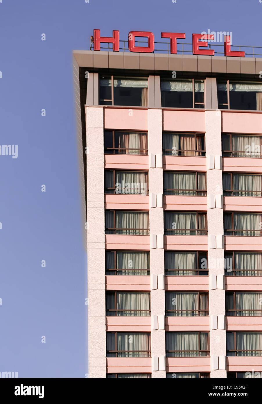 Picture of a hotel isolated on blue Stock Photo - Alamy