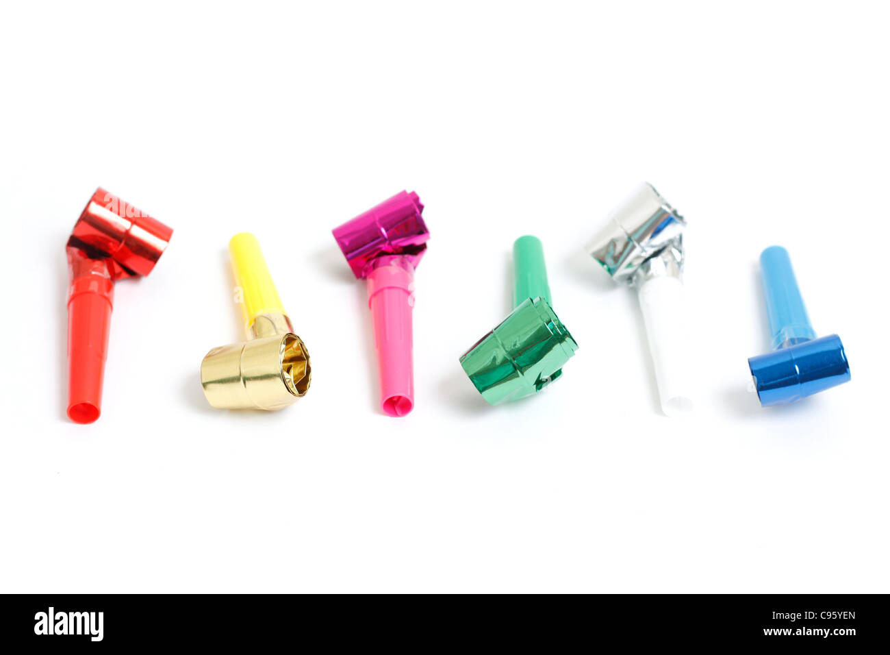 Party blowers isolated on white Stock Photo - Alamy