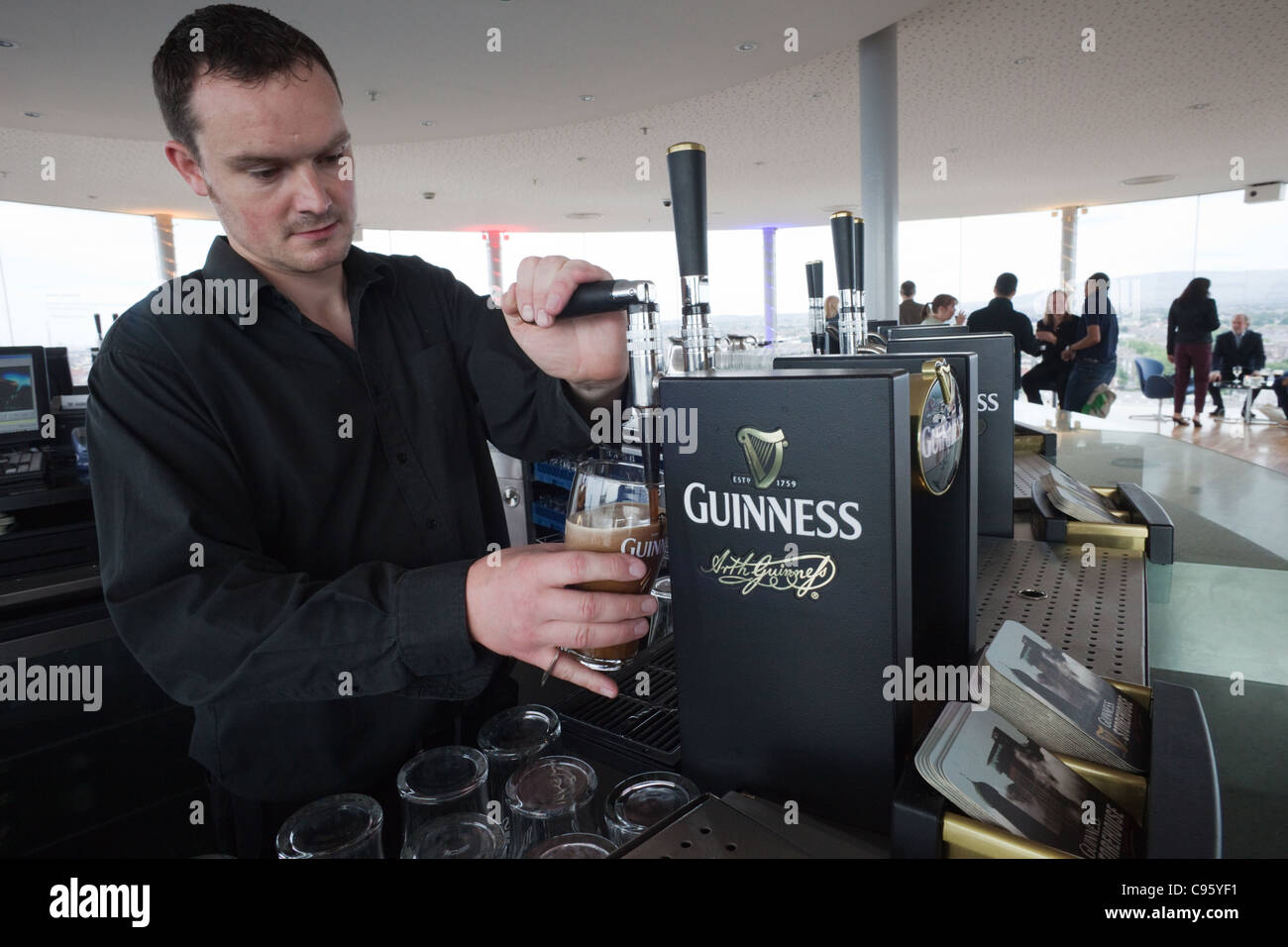 Republic of Ireland, Dublin, Guinness Storehouse, Bartender Pouring ...