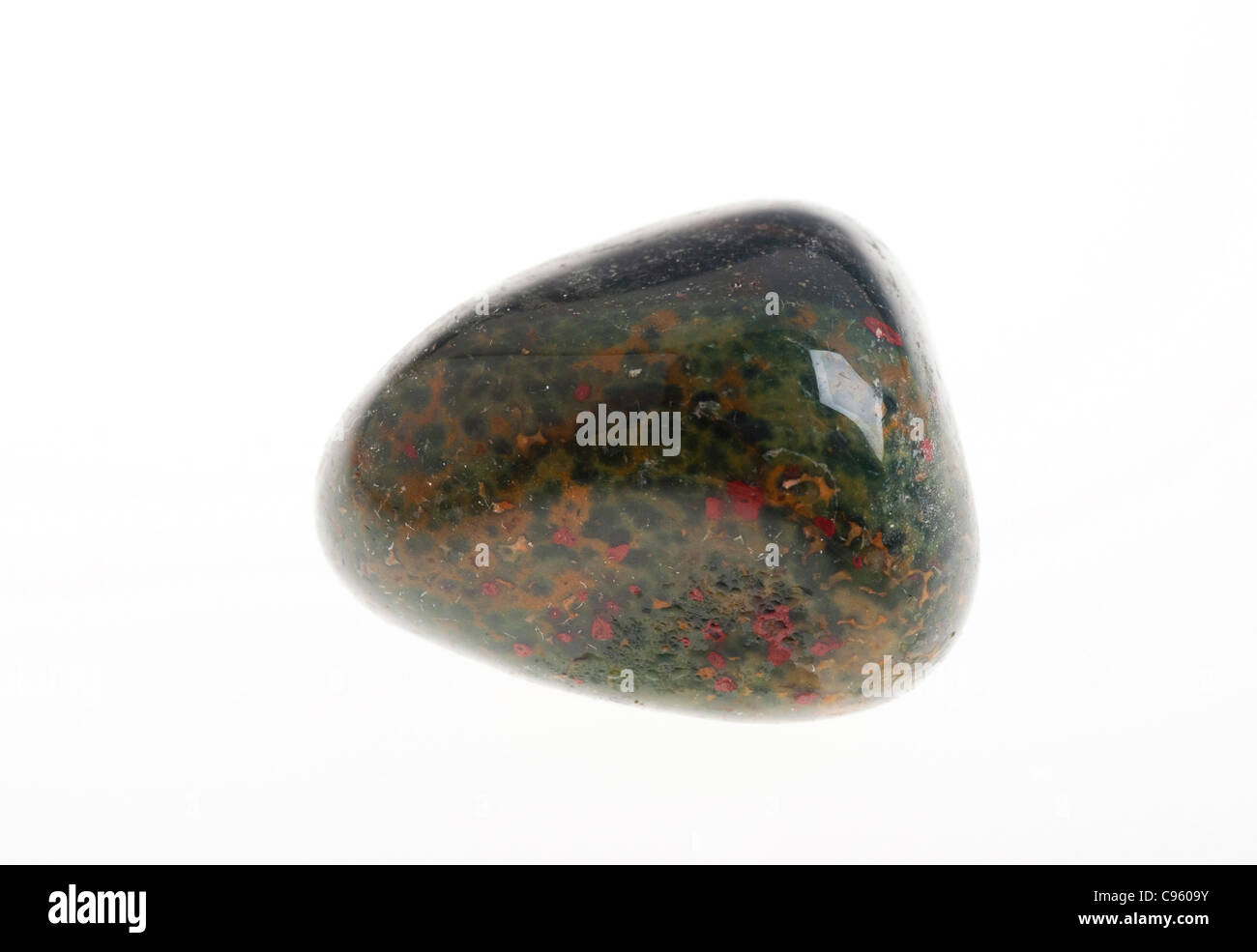 Cutout of a Heliotrope or bloodstone gemstone on white background Stock ...