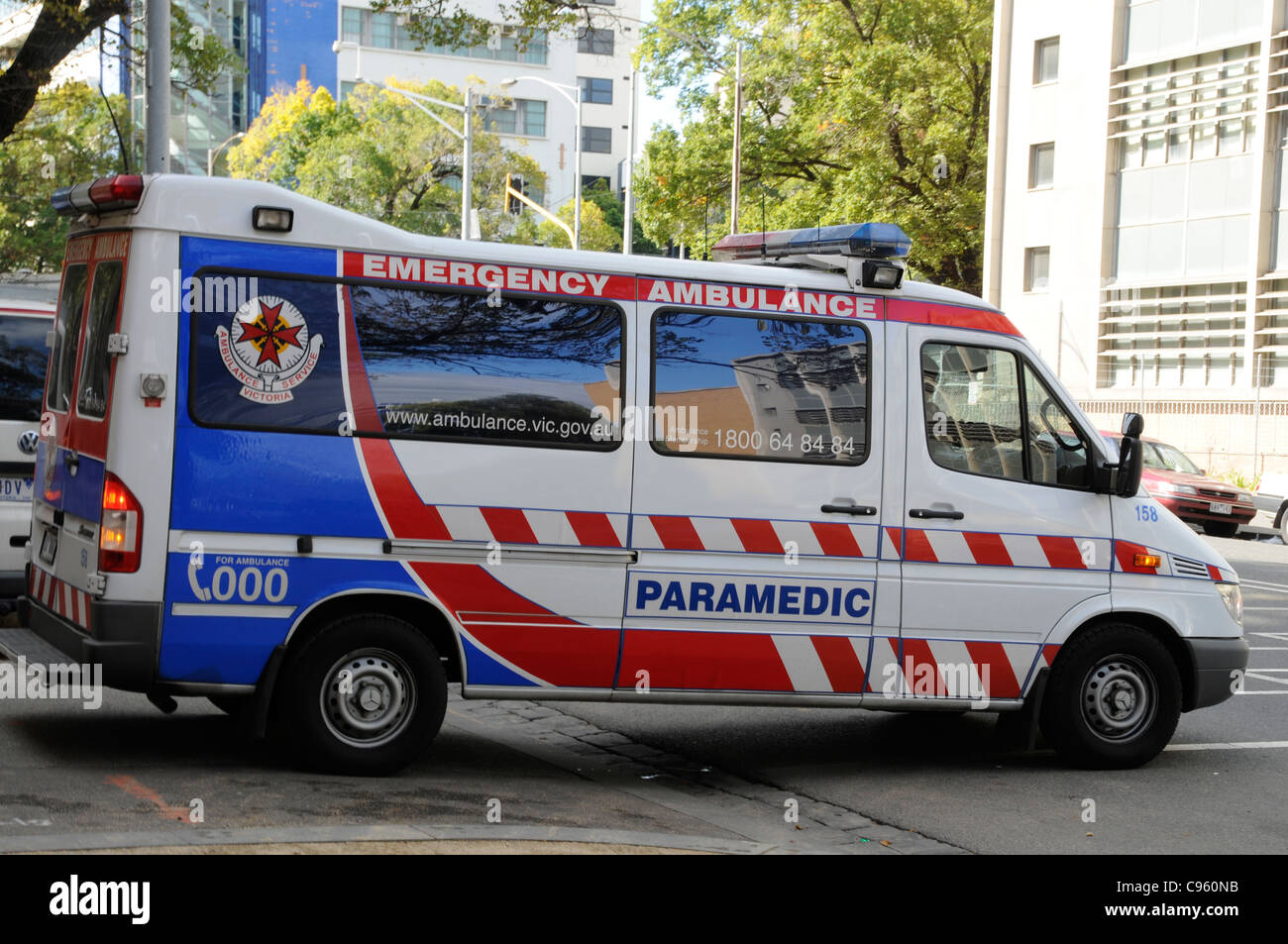 An ambulance leaving the Royal Melbourne Hospital in Melbourne ...