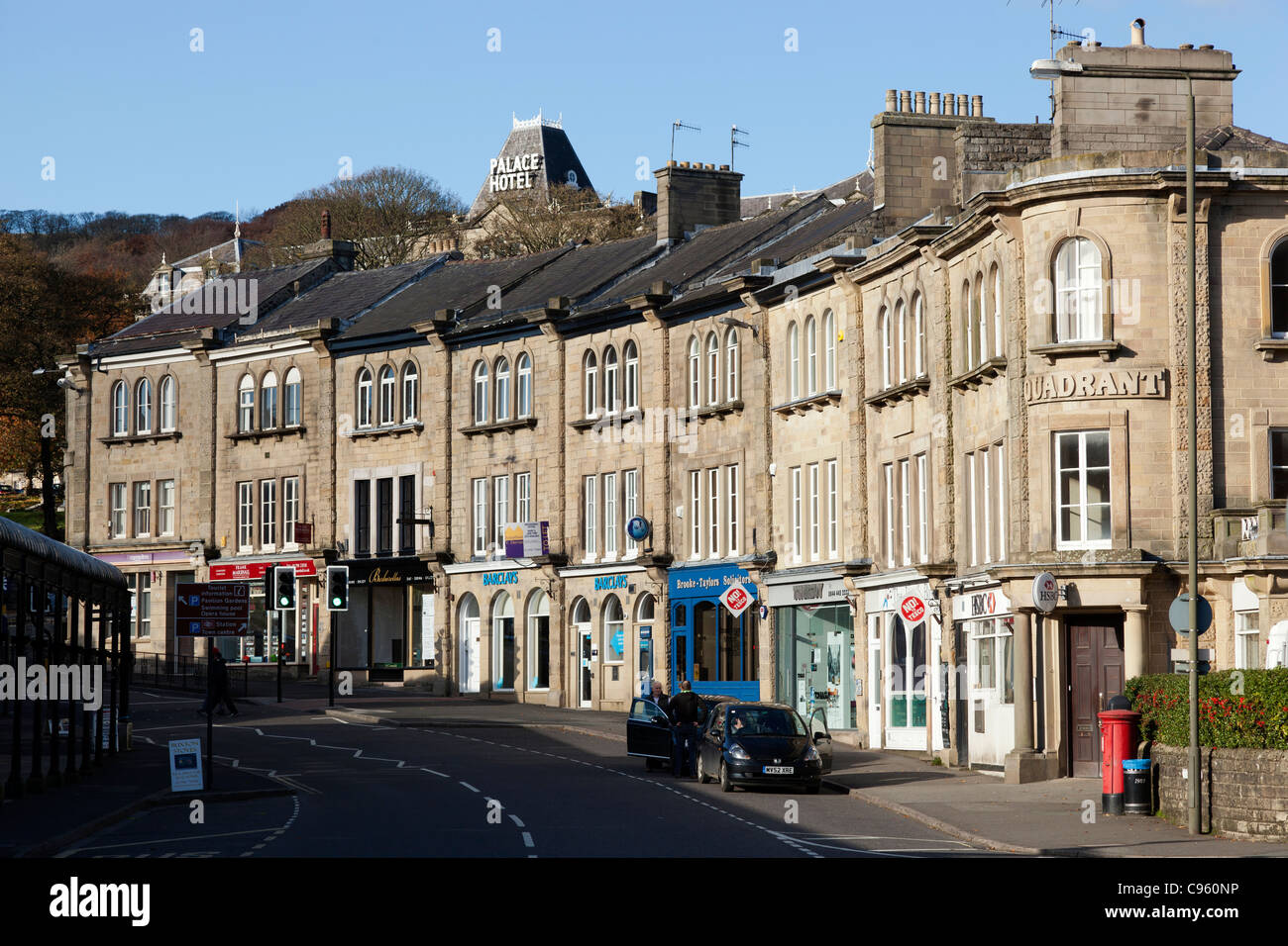 Buxton the Quadrant row of shops Stock Photo - Alamy