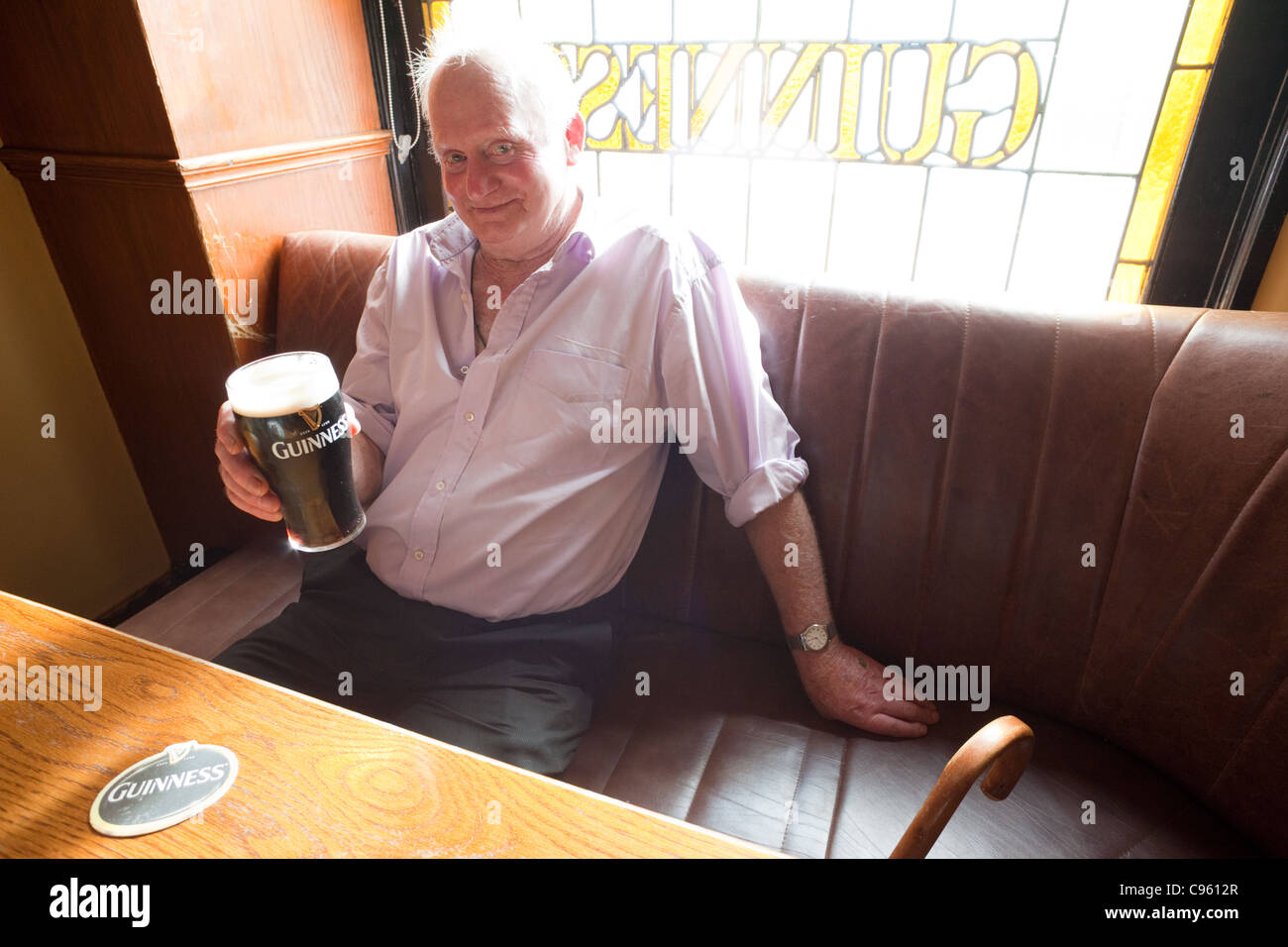 Republic of Ireland, Elderly Man Drinking Guinness Stock Photo - Alamy