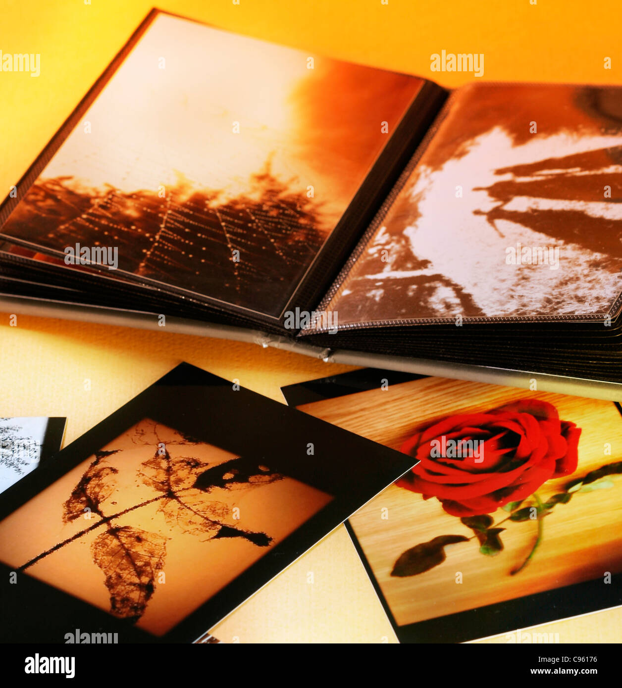 Close-up of opened photo album Stock Photo - Alamy