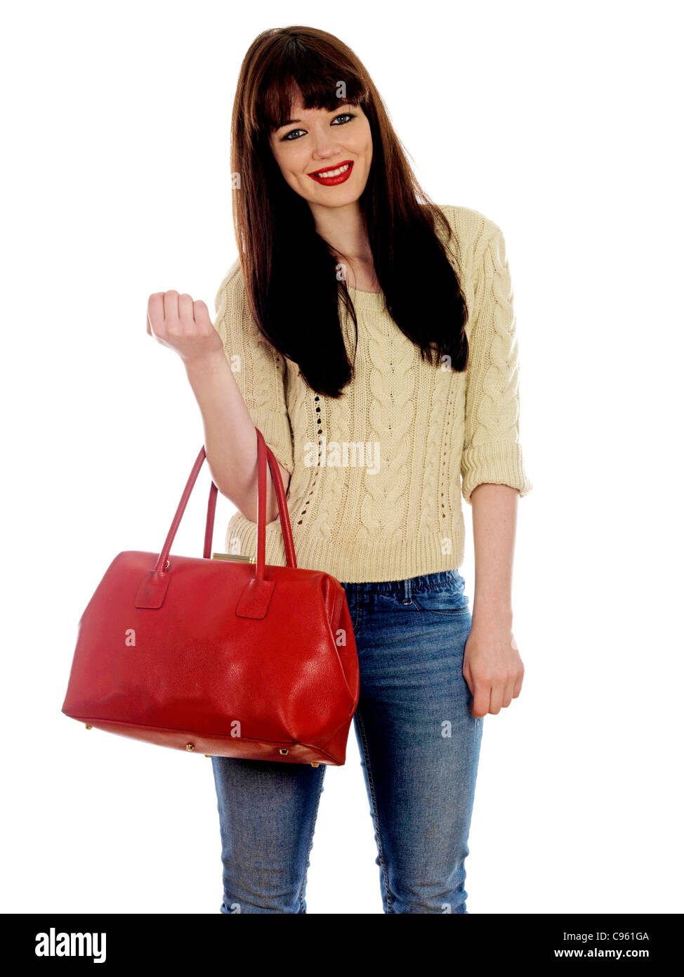 Young Woman Holding a Red Handbag. Model Released Stock Photo - Alamy