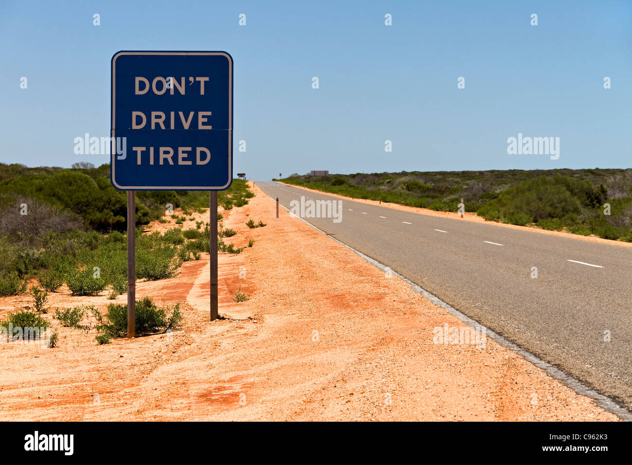 Don't drive tired road sign, Northwest Australia Stock Photo - Alamy