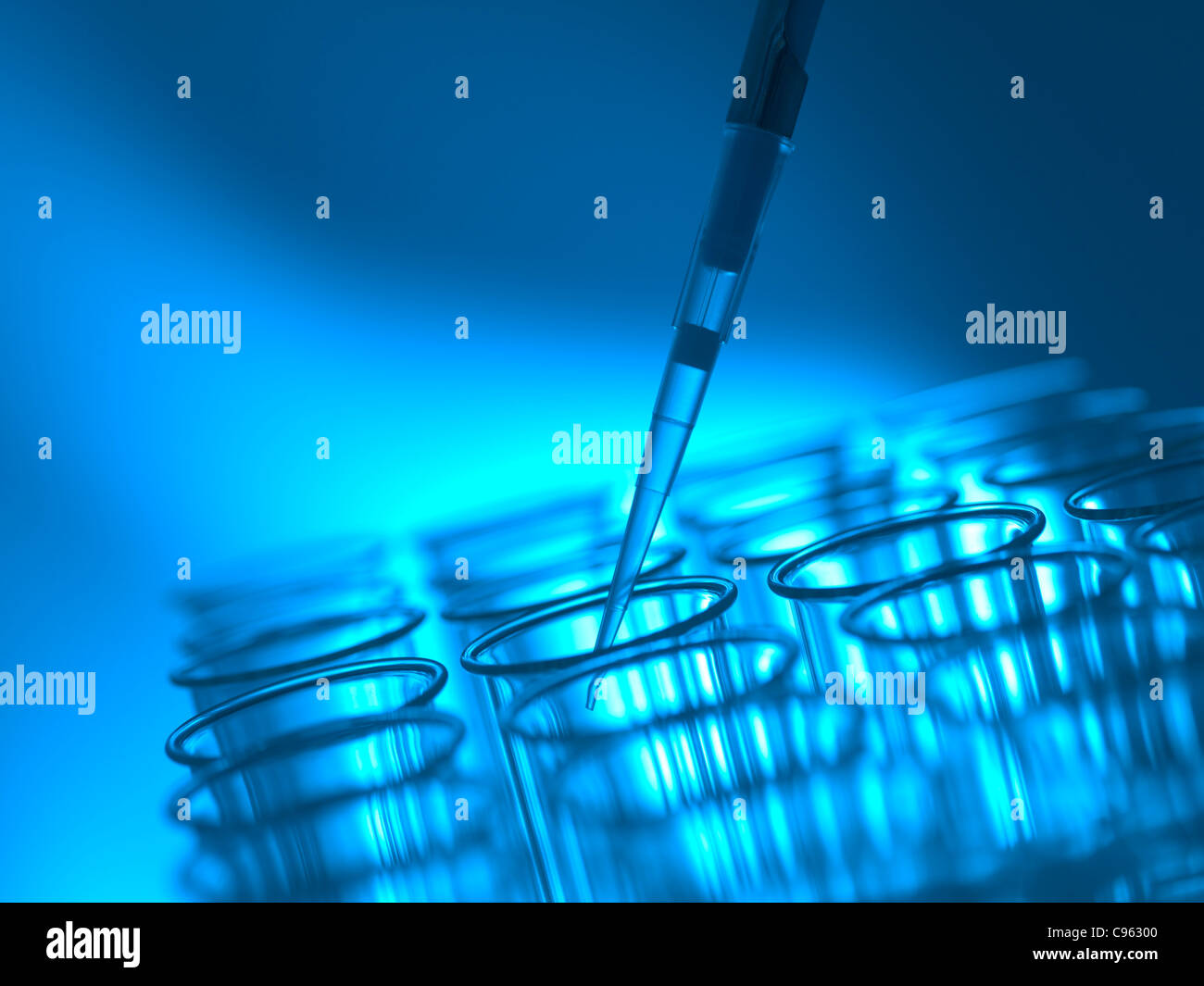 Pipetting liquid into a test tube Stock Photo - Alamy